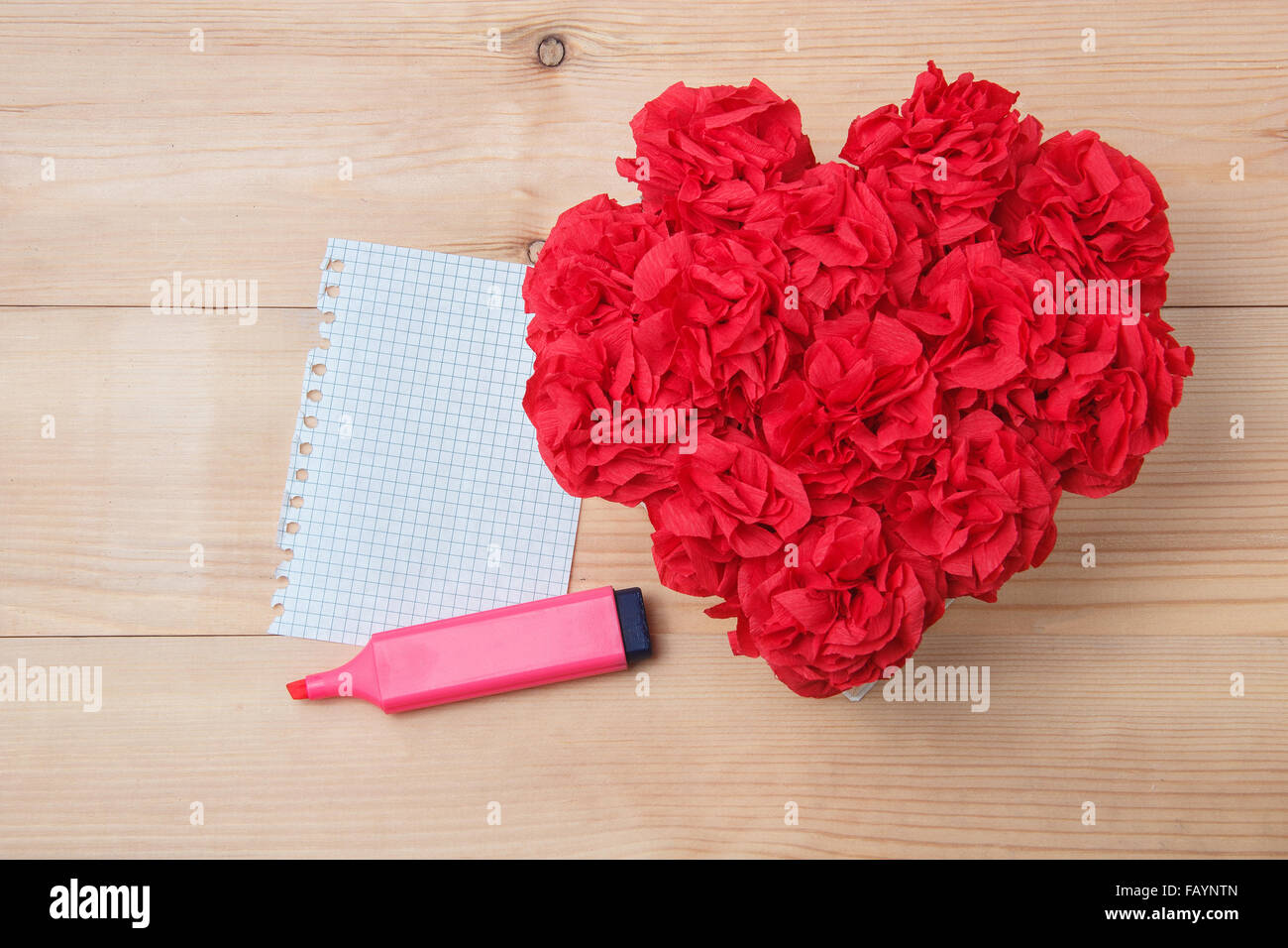 Handmaid flowers in box with blank card on brown wooden background ...