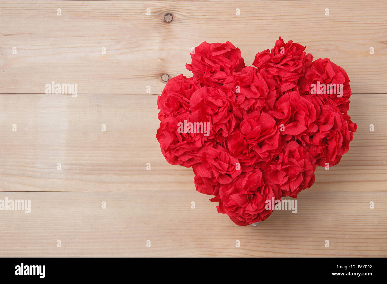 A handmaid flowers in box on brown wooden background Stock Photo - Alamy