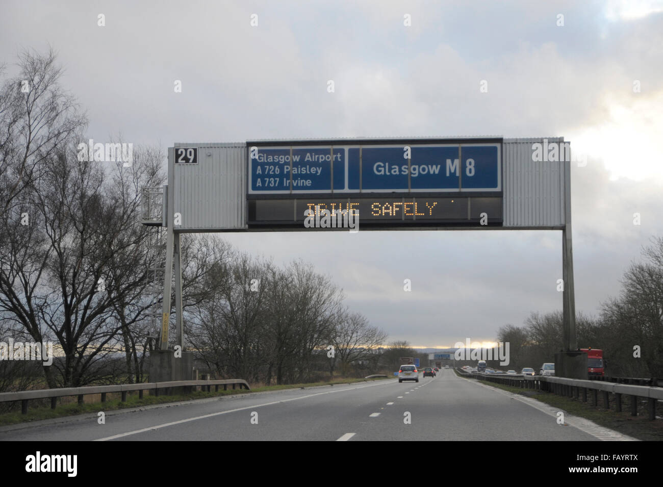 Overhead gantry electronic warning signs on M8 Glasgow, Scotland ...