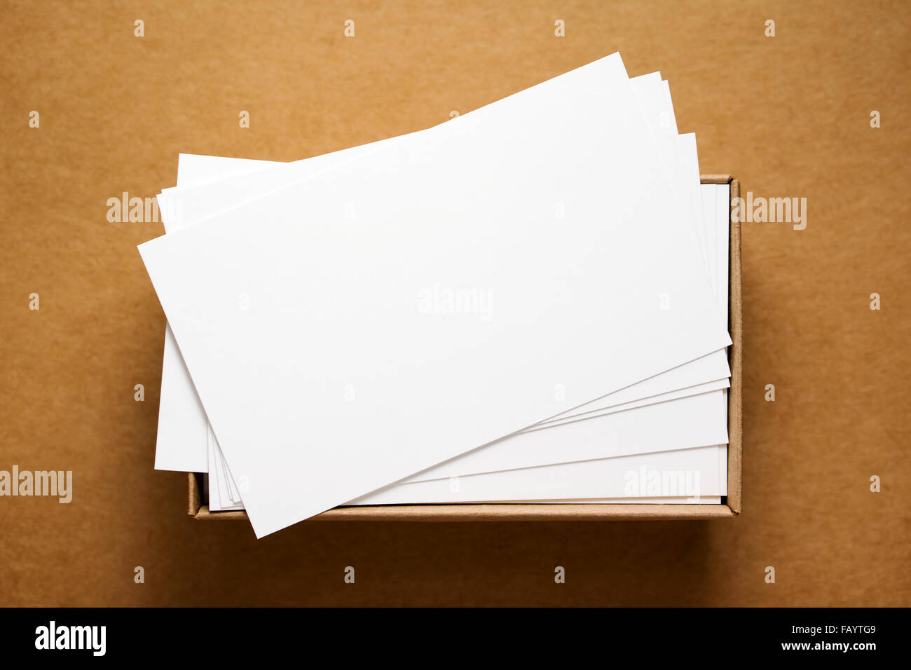 Business cards in box on kraft cardboard background Stock Photo - Alamy