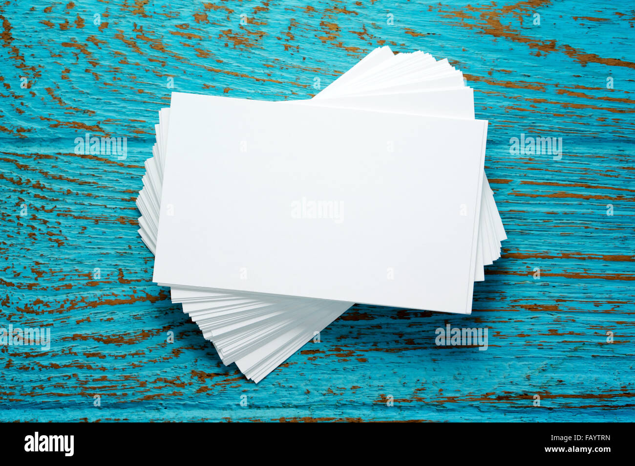 Stack of blank business cards on blue wood desk Stock Photo - Alamy