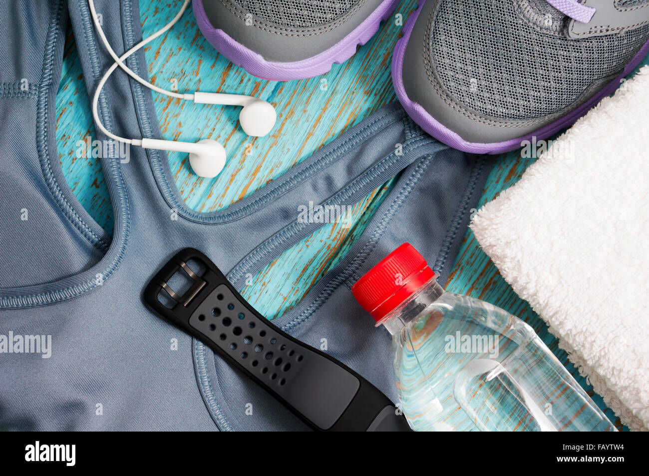 Workout set with sport clothing, heart rate monitor watch, sneakers ...