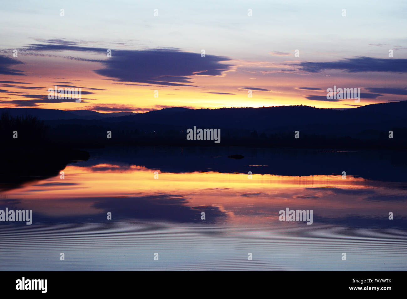 Sunset reflected on the water hi-res stock photography and images - Alamy