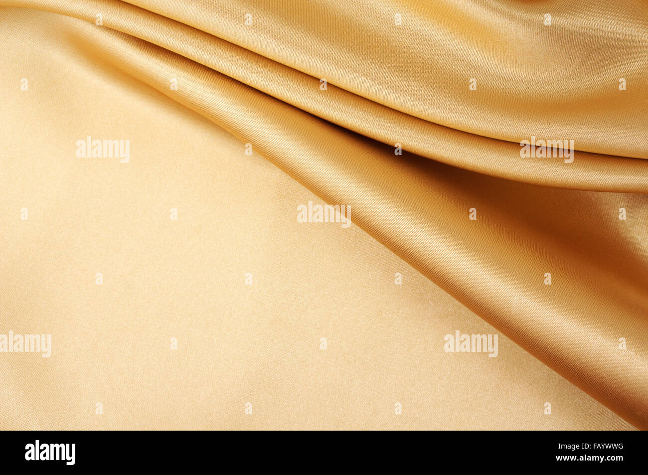 Gold satin silk fabric background Stock Photo - Alamy