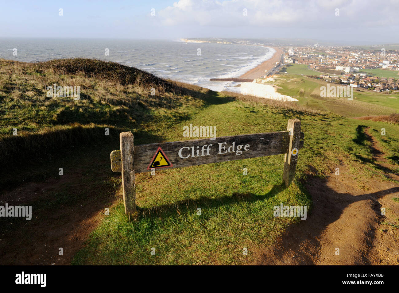 Cliff Edge warning sign at Seaford Head Cliffs in East Sussex part of ...