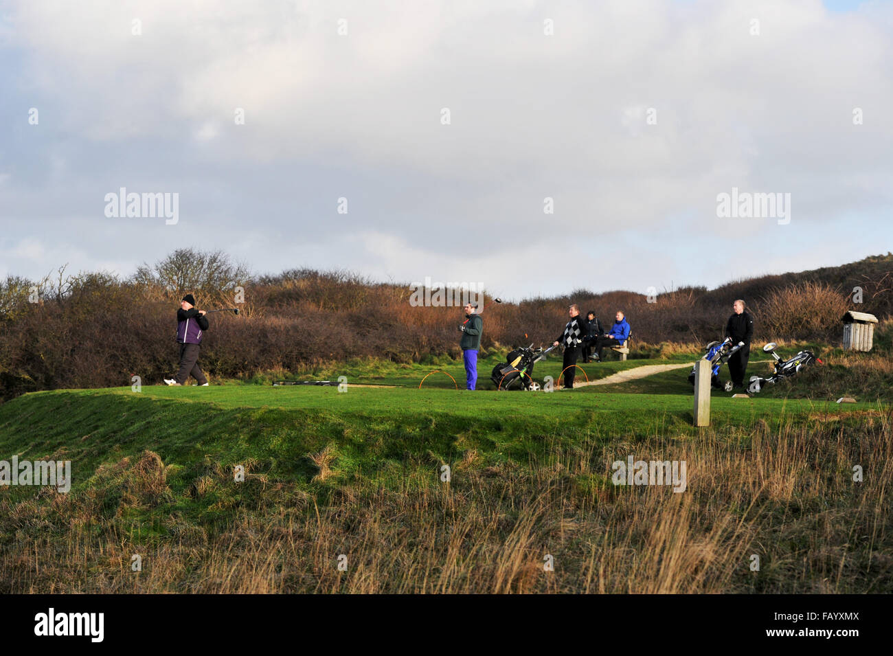 Golfers tee off at The Eighteenth Hole on Seaford Head Golf Course on ...