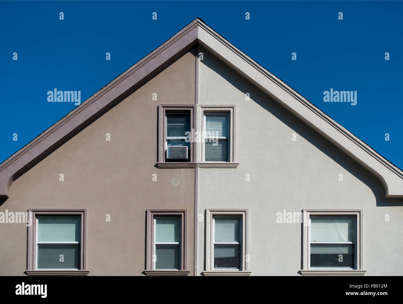 house painted in half with two different colors USA Stock Photo - Alamy
