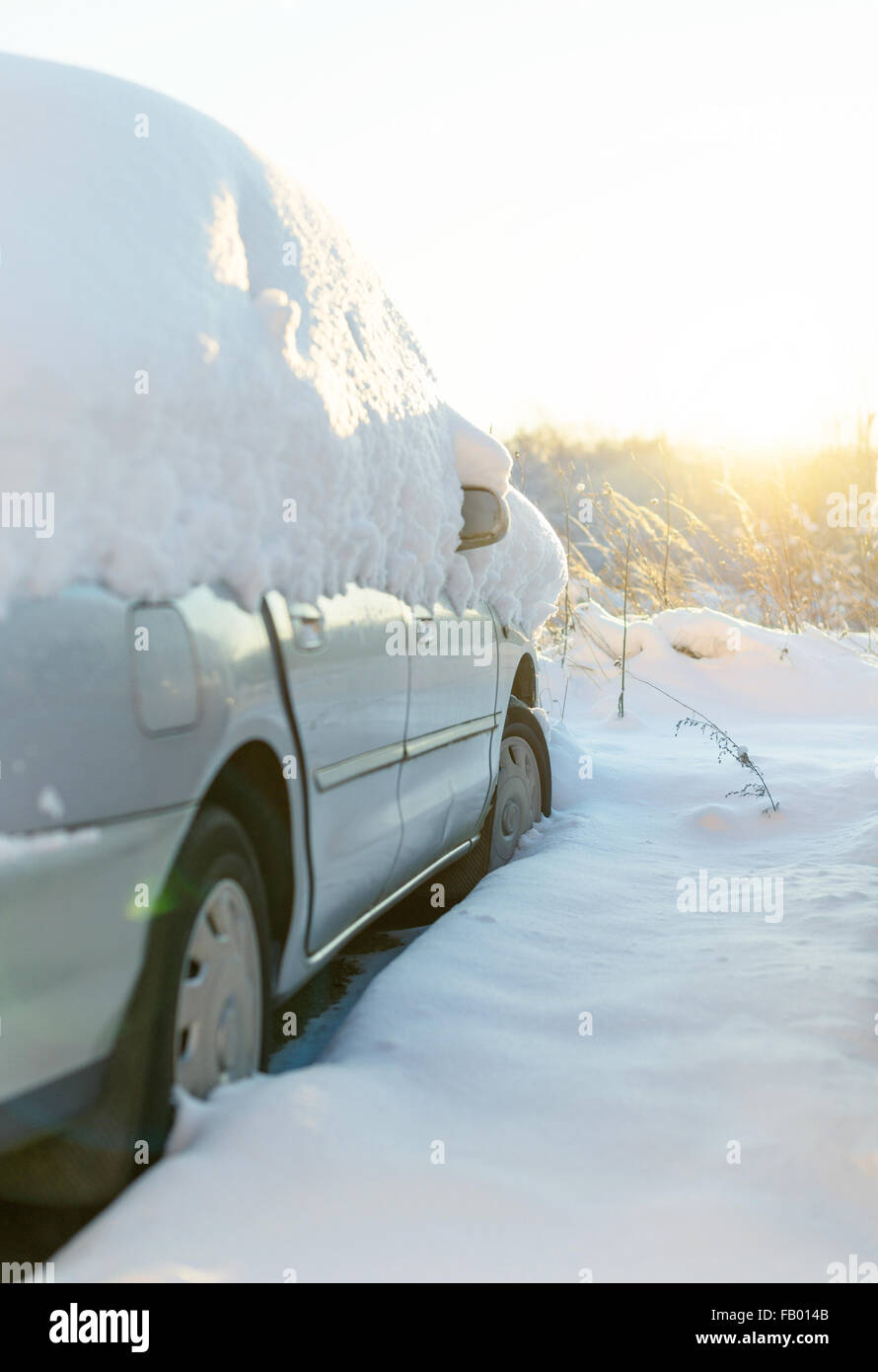 Car covered with snow in the winter Stock Photo - Alamy