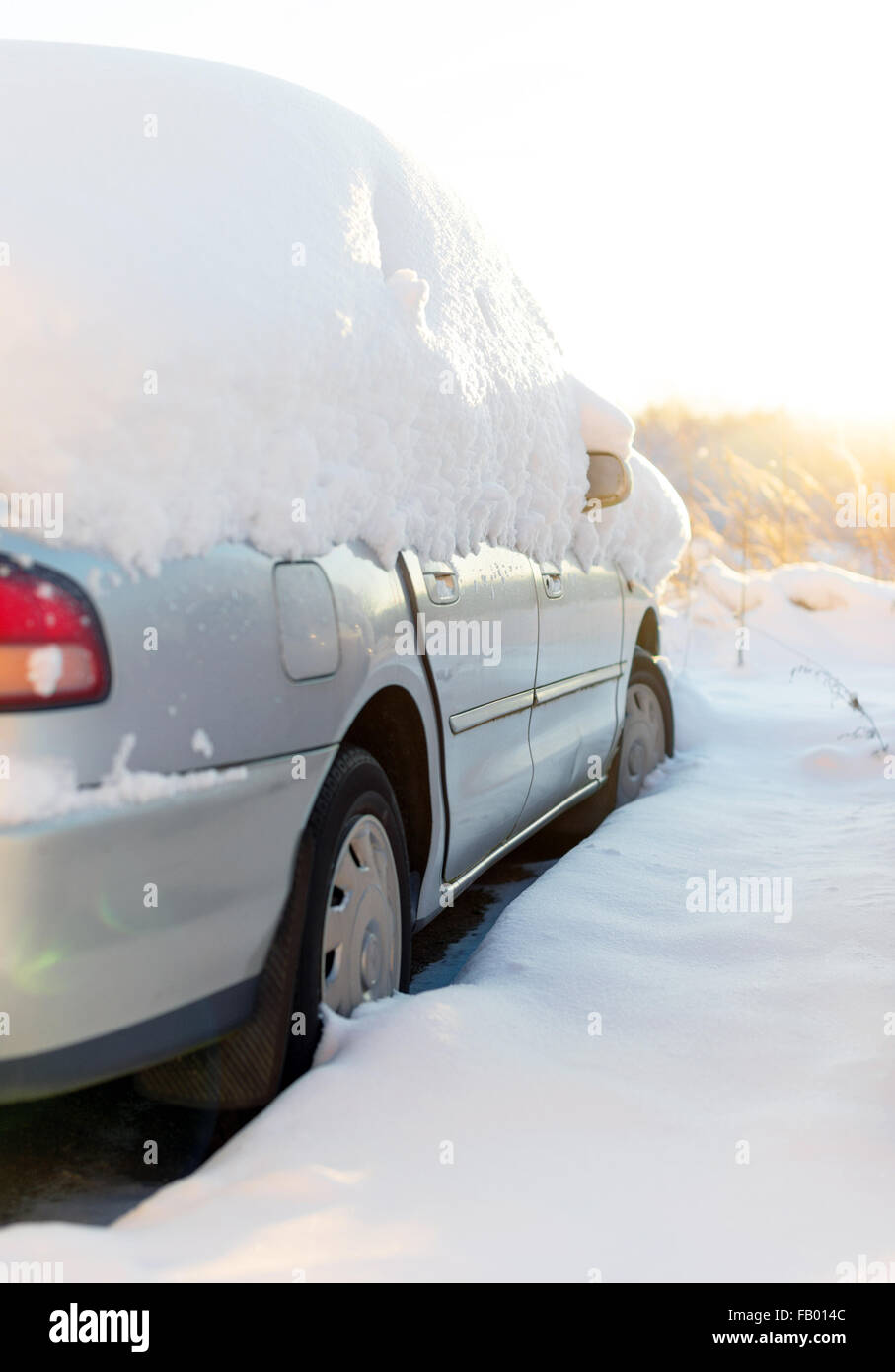 Car covered with snow in the winter Stock Photo - Alamy