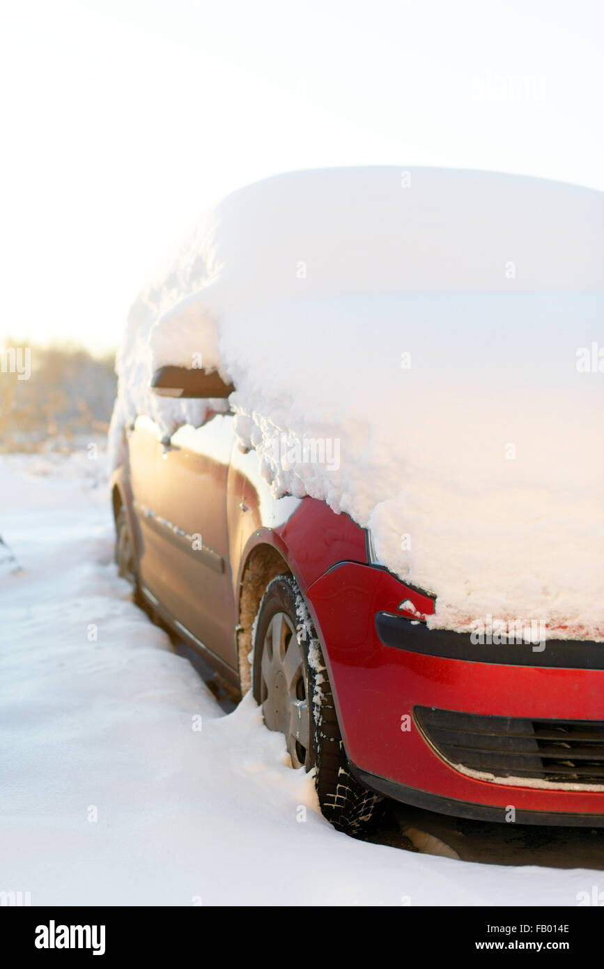 Car covered with snow in the winter Stock Photo - Alamy