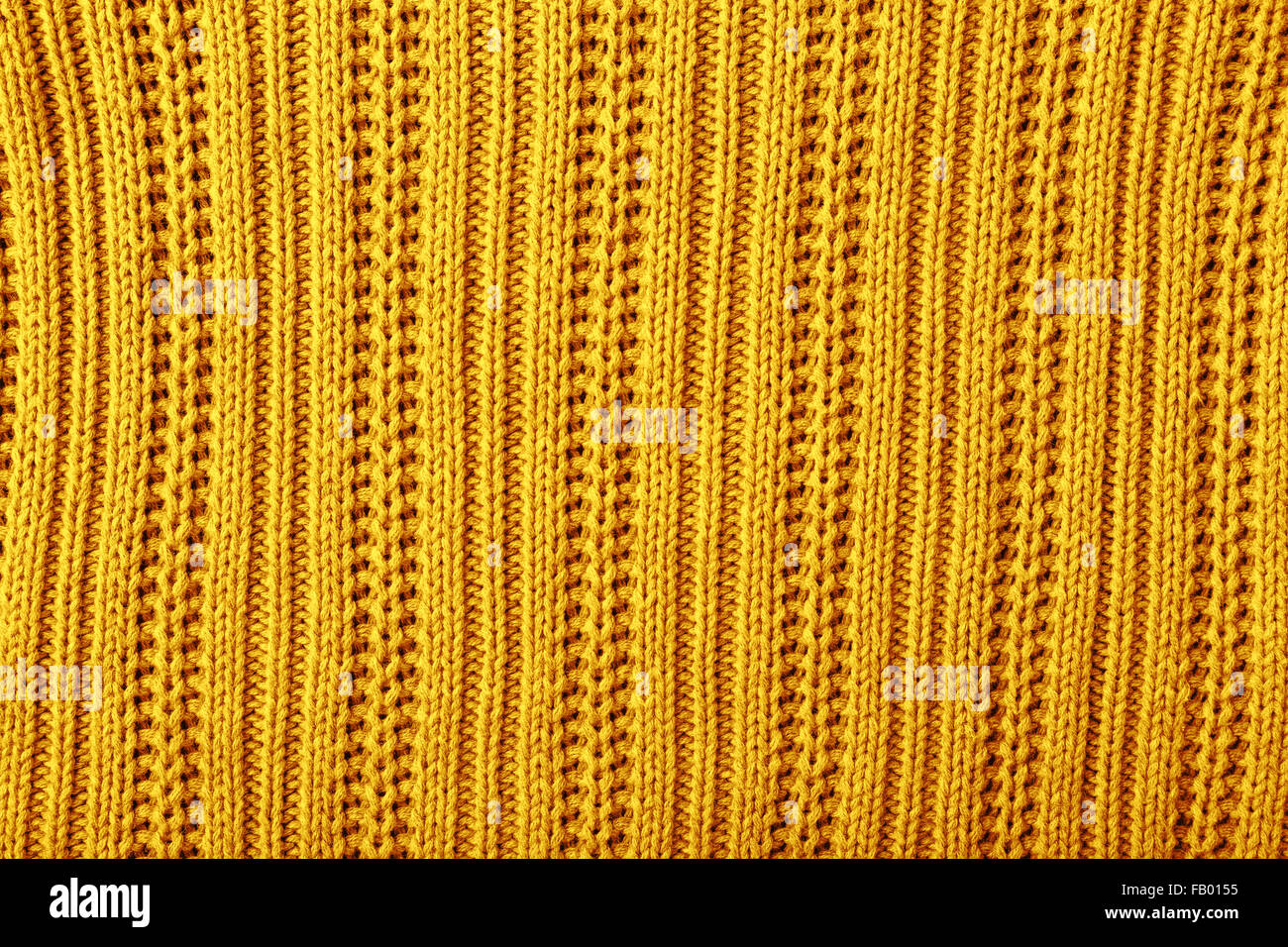Knit wool fabric in yellow texture and background Stock Photo - Alamy