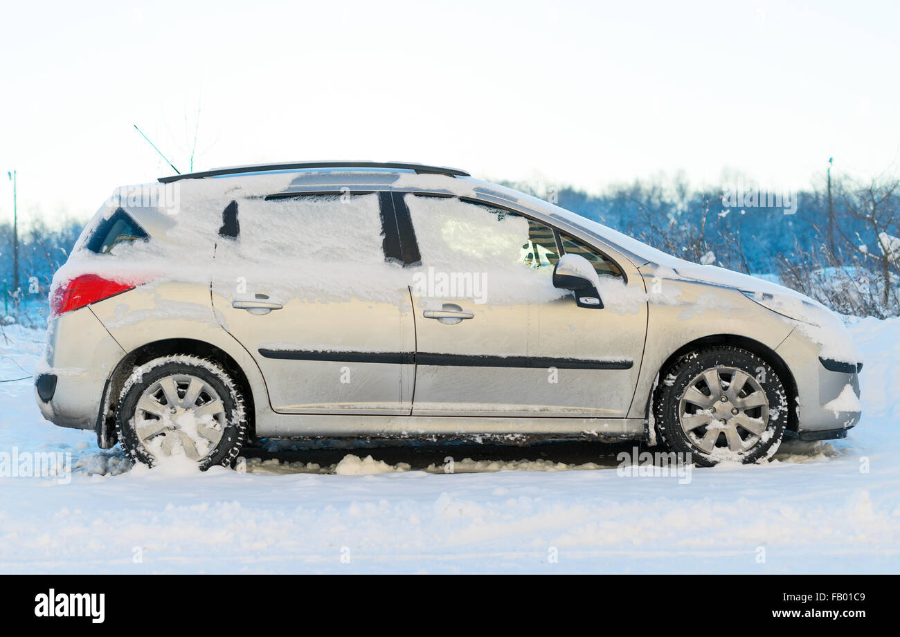 Car covered with snow in the winter Stock Photo - Alamy