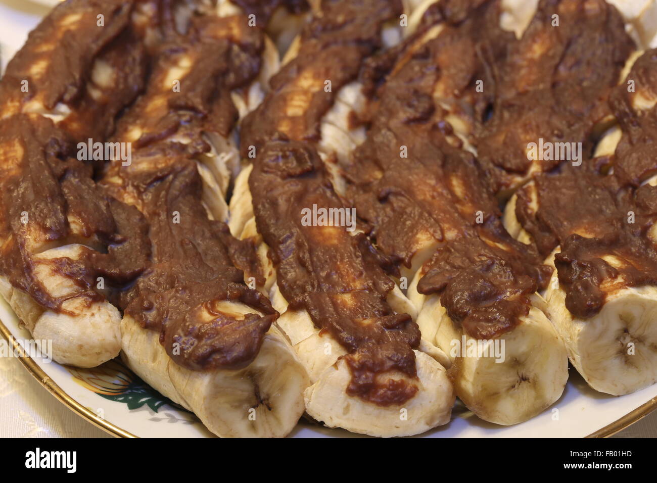 bananas with chocolate Stock Photo - Alamy
