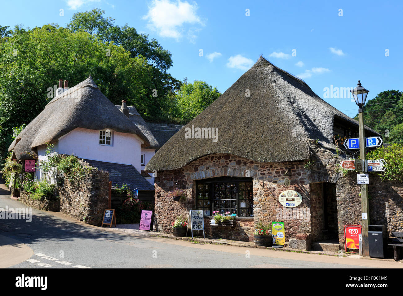 Old thatched cottages in the centre of Cockington, an old picturesque ...