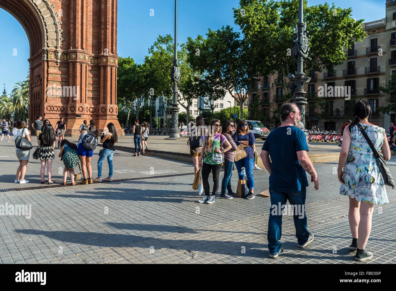 Group of girls taking pictures while on holiday in Barcelona, Catalonia ...