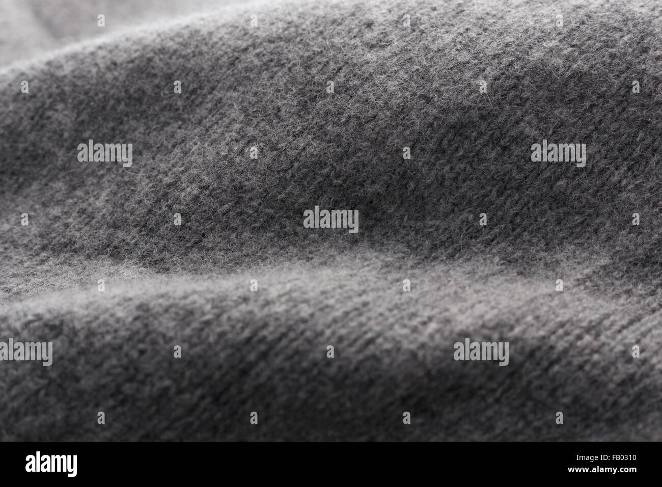 Wool fabric in grey close up texture Stock Photo - Alamy
