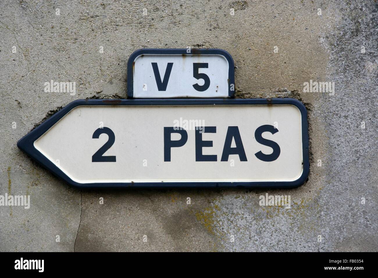 Two peas sign Stock Photo - Alamy
