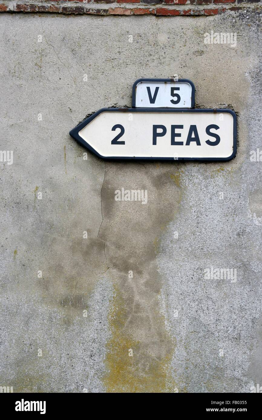Two peas sign Stock Photo - Alamy