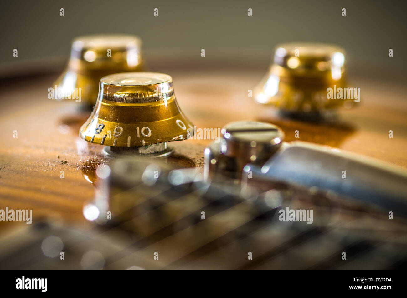 close up image of electric guitar volume control Stock Photo - Alamy