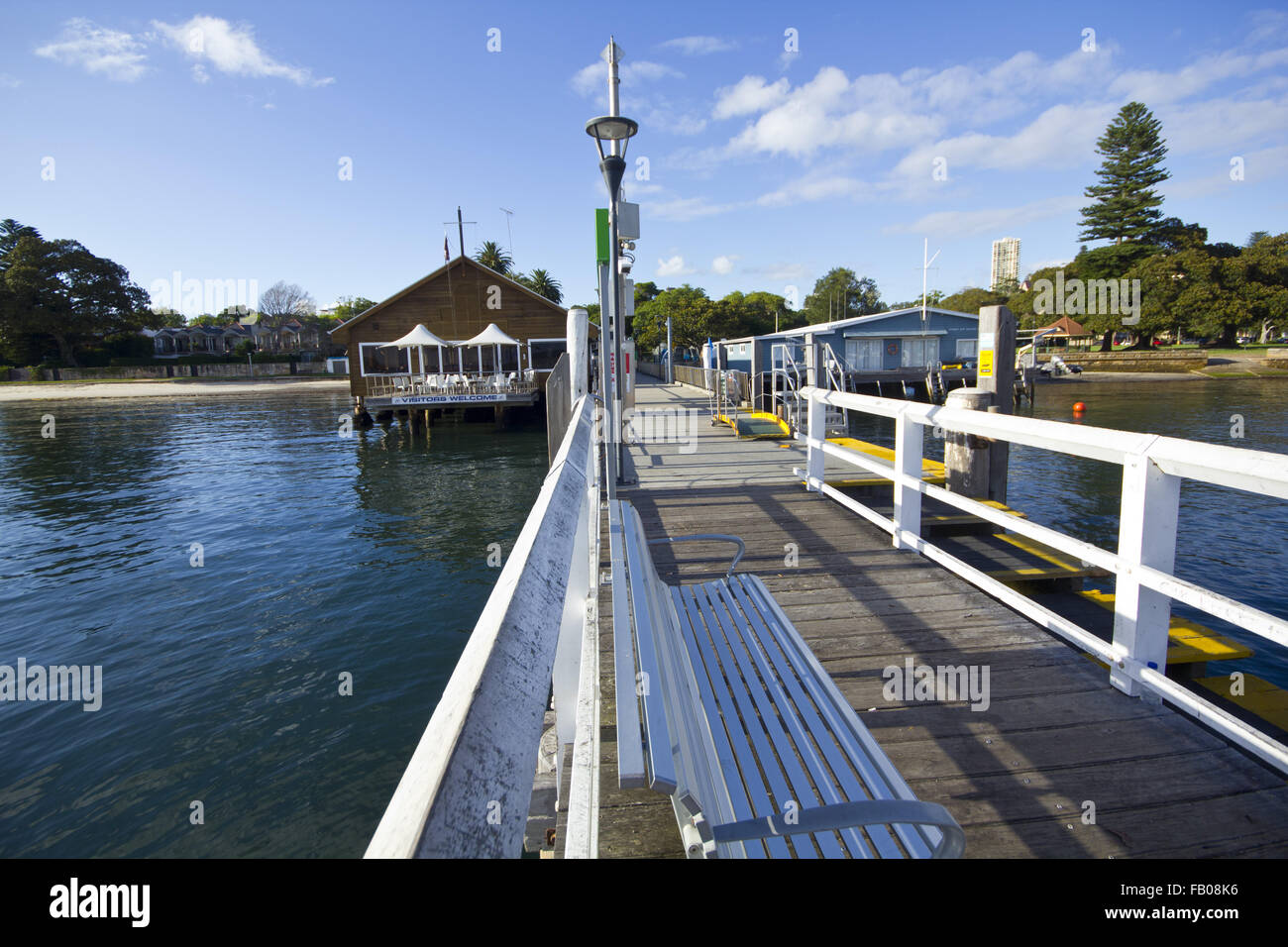 Double Bay ferry wharf on Sydney harbour with the Sydney 18-footer ...