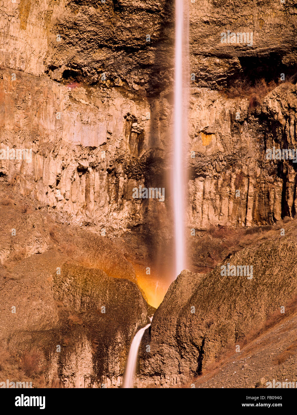 martin falls spilling over basalt cliffs near grand coulee, washington ...