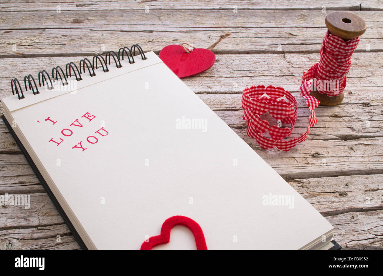 ribbon and notebook with I love you Stock Photo - Alamy