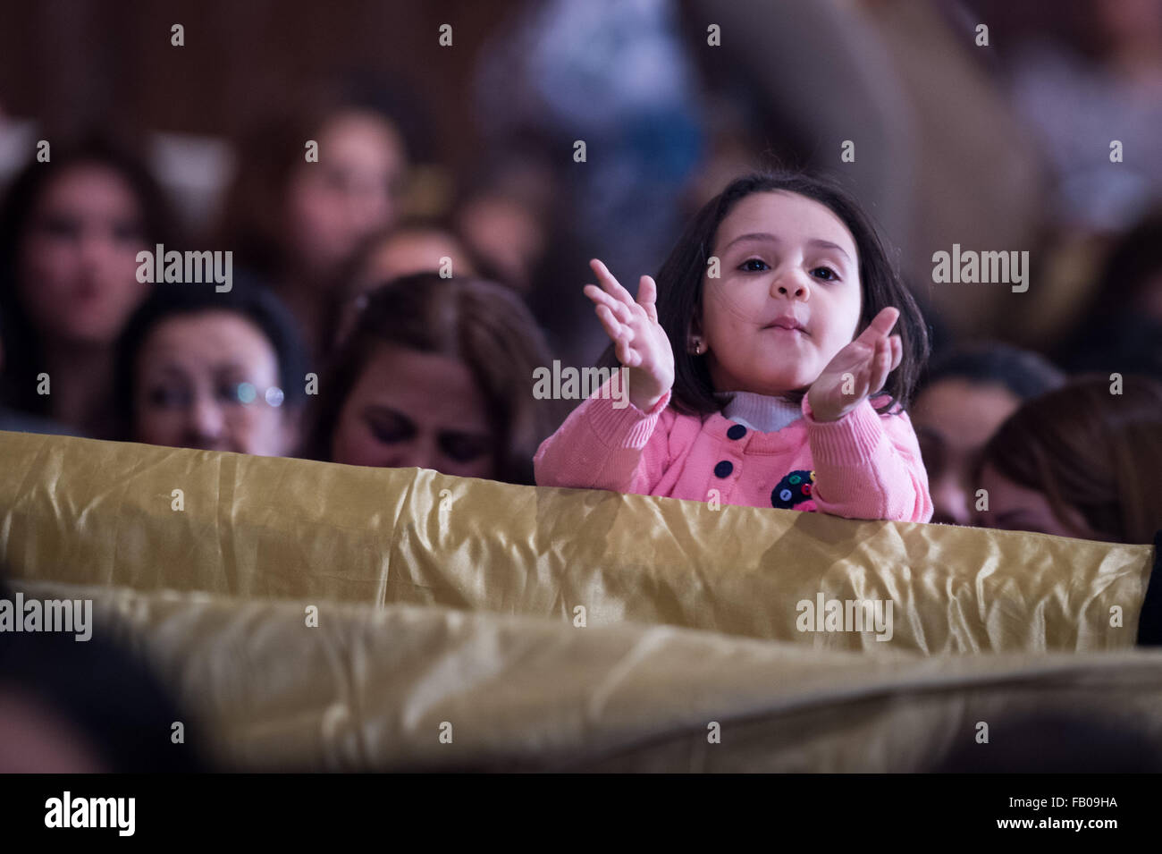 Cairo, Egypt. 6th Jan, 2016. A little girl prays during the Coptic ...