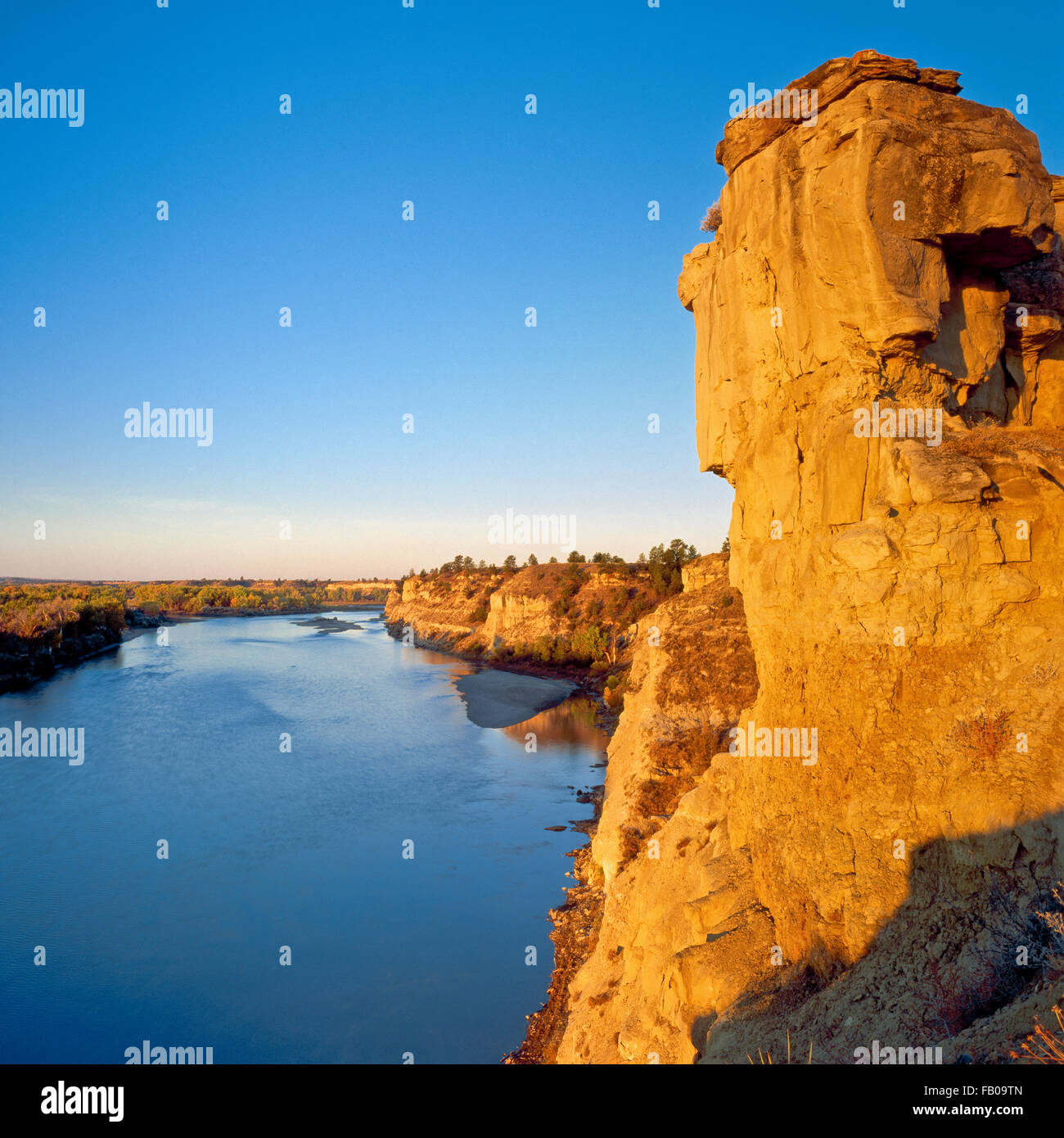 sunrise light on cliffs above the yellowstone river near custer ...