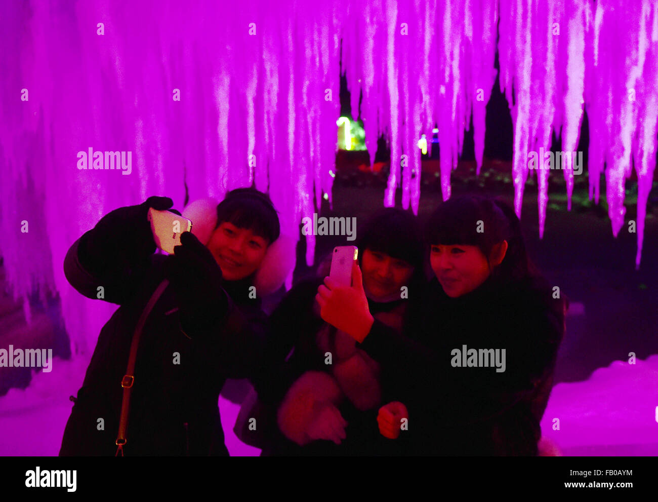 Benxi, China's Liaoning Province. 6th Jan, 2016. A tourist poses for a ...