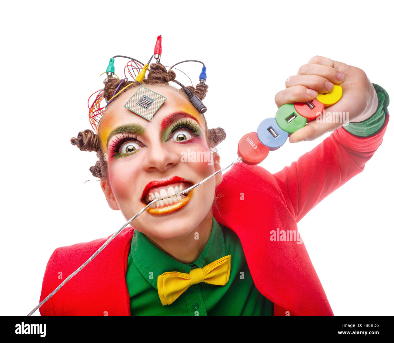 Girl geek biting a wire. Crazy programmer Stock Photo - Alamy