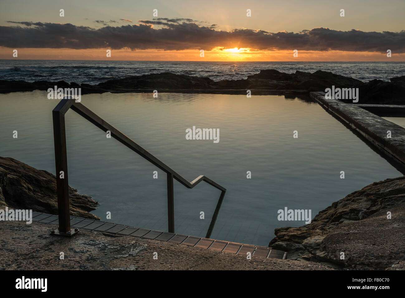Ocean swimming pool at sunrise Stock Photo - Alamy
