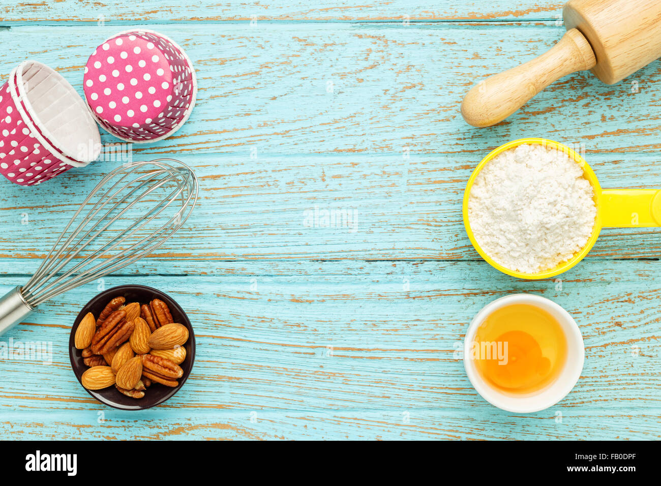 Bake background with baking ingredients on wood table Stock Photo - Alamy