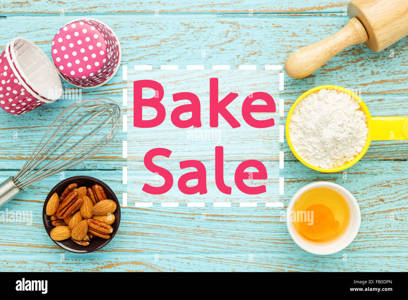 Bake sale with baking ingredients on wood table Stock Photo - Alamy