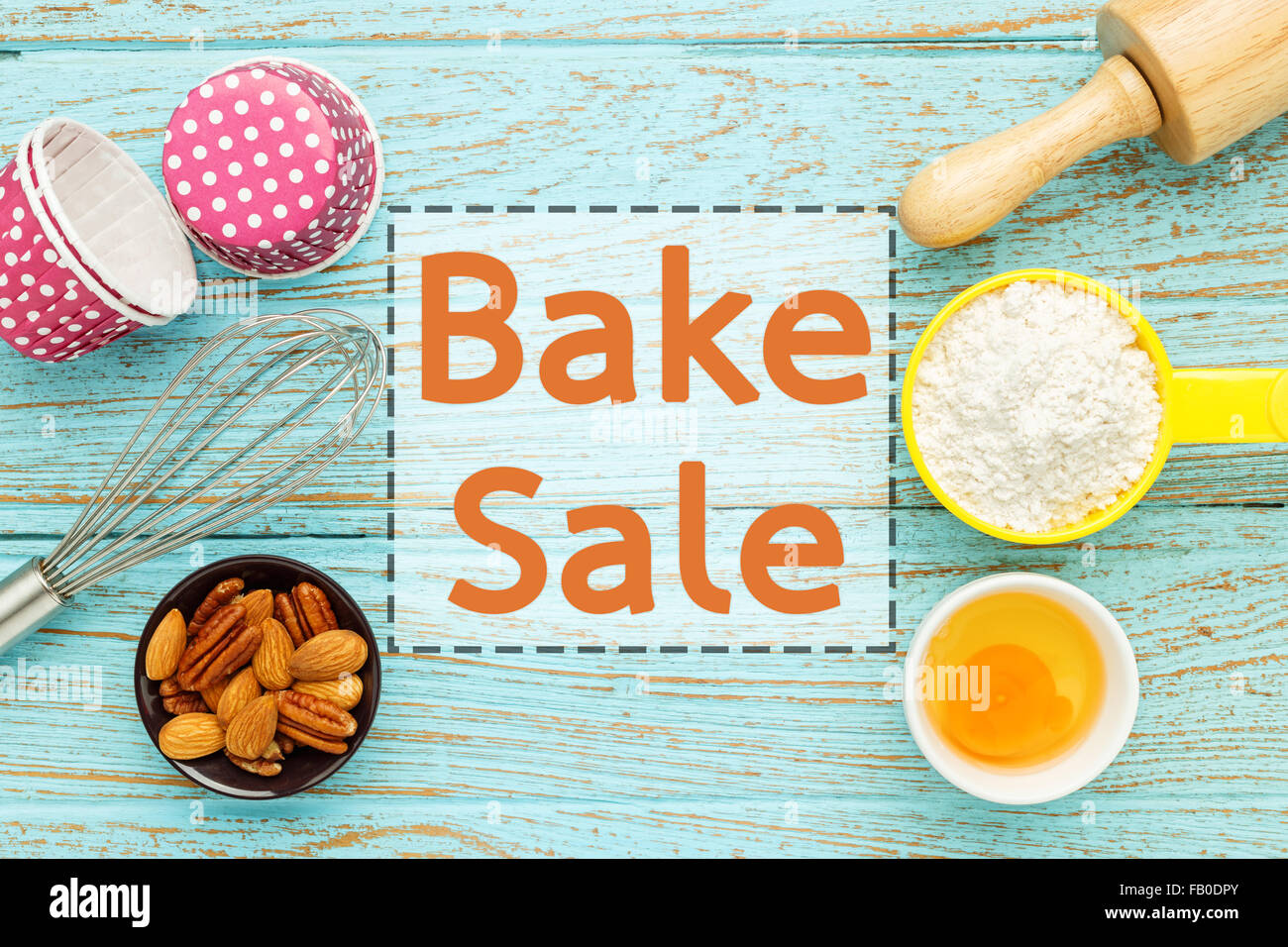 Bake sale background with baking ingredients on wood table Stock Photo ...