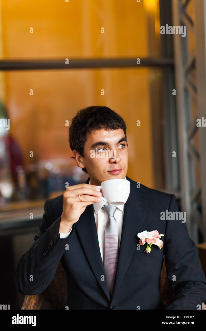 groom drinking coffee Stock Photo - Alamy