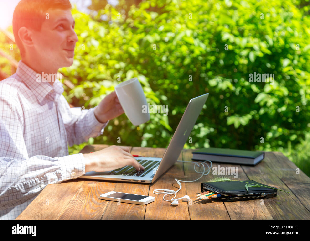 Working man inspired by nature Stock Photo - Alamy