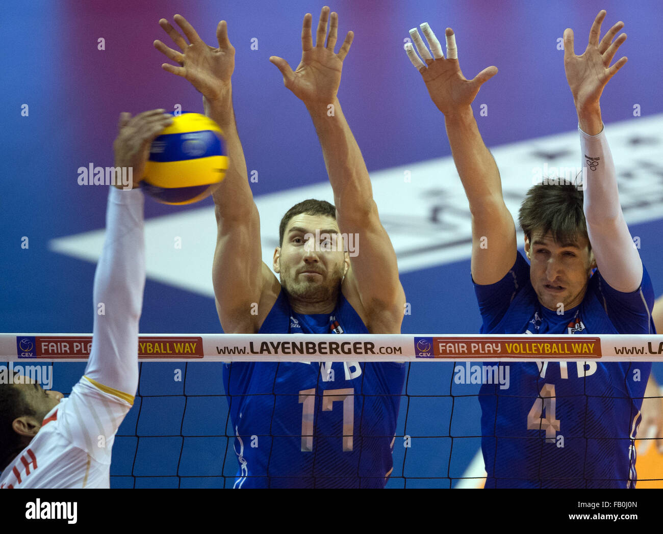 Berlin, Germany. 06th Jan, 2016. Russia's Maxim Mikhaylov (C) and Artem ...