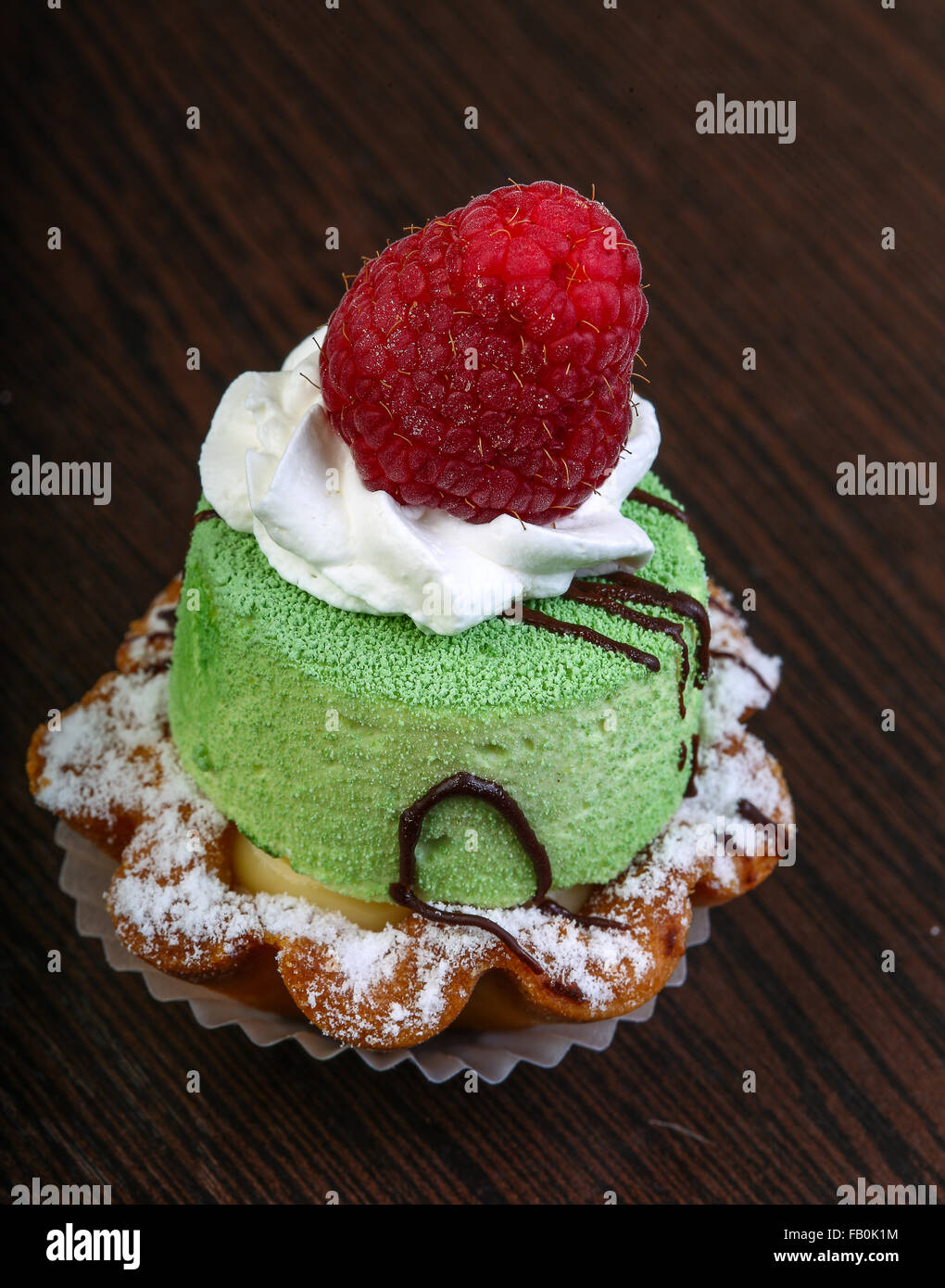 Sweet Pastry with berries on the wood background Stock Photo - Alamy