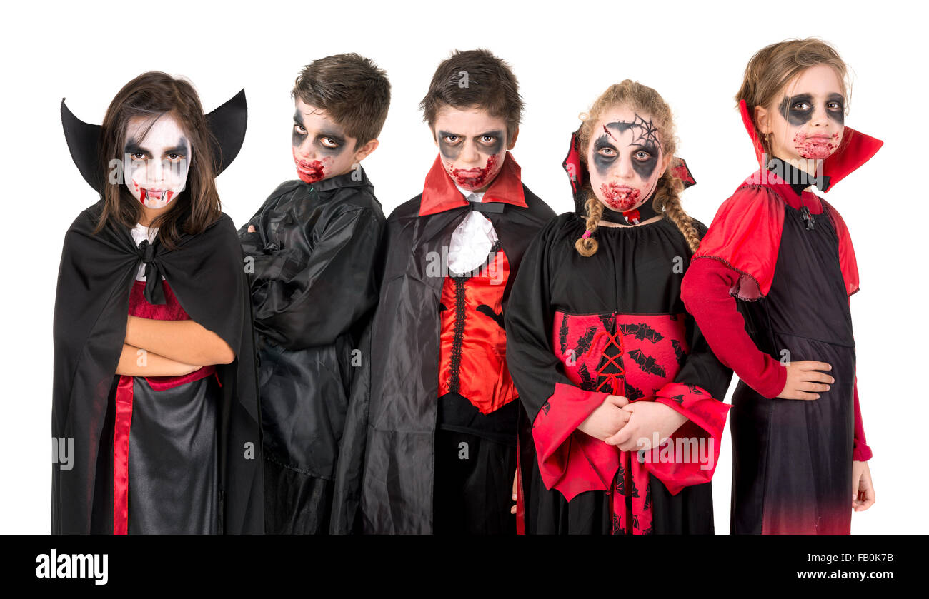Group of kids with face-paint and Halloween vampire costumes Stock ...
