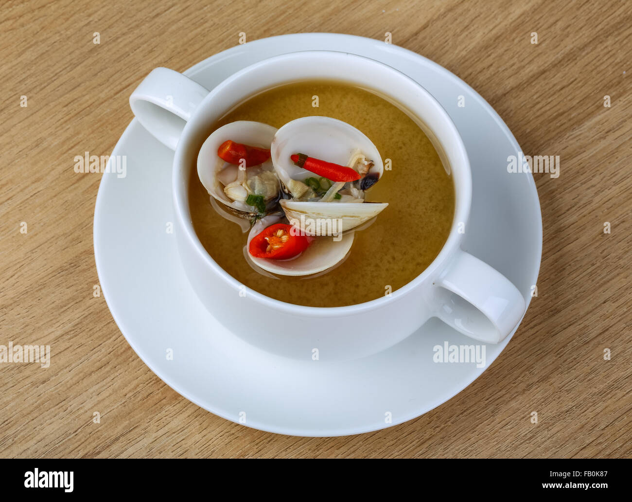 Asian traditional Shell soup on the wood background Stock Photo - Alamy