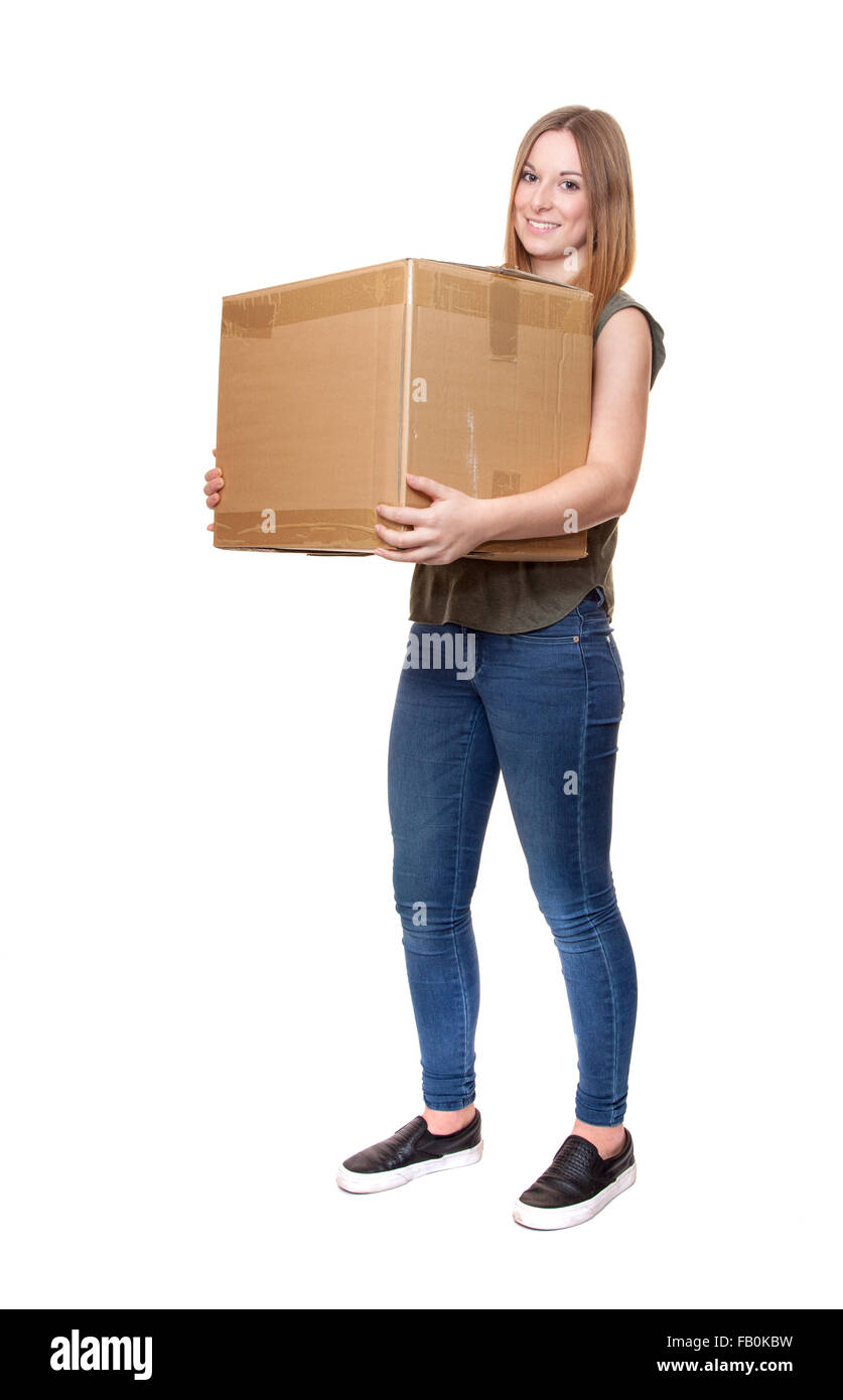 Attractive young woman carrying moving boxes Stock Photo - Alamy