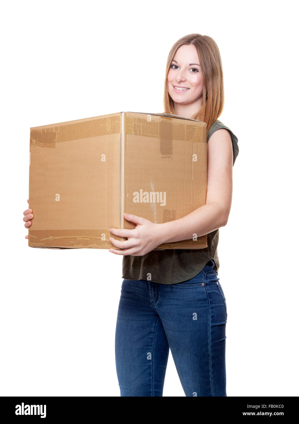 Attractive young woman carrying moving boxes Stock Photo - Alamy
