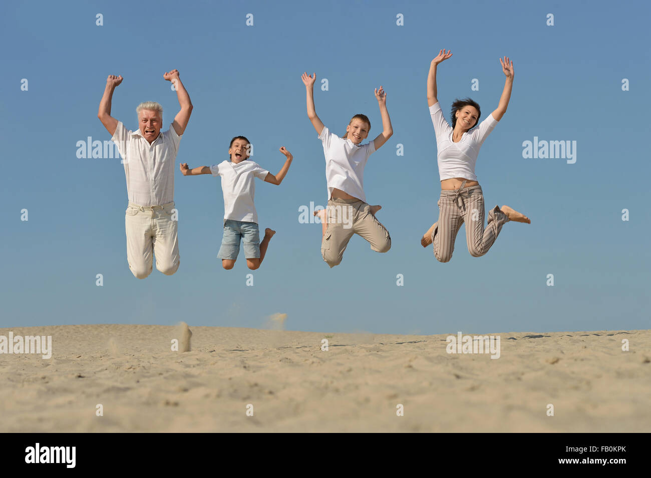 Portrait of a friendly family Stock Photo - Alamy