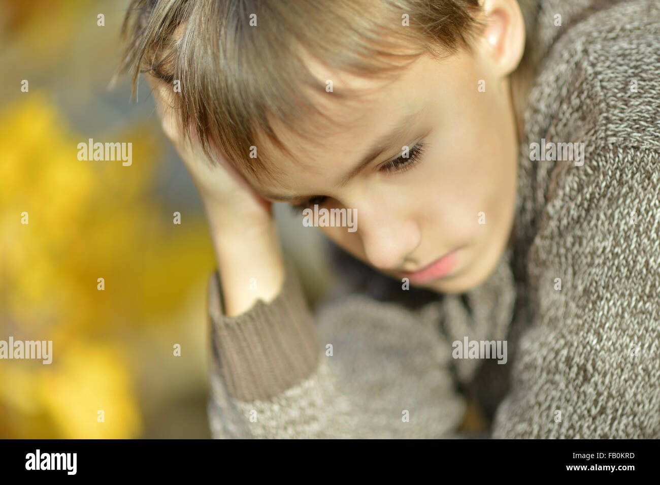 Little sad boy Stock Photo - Alamy