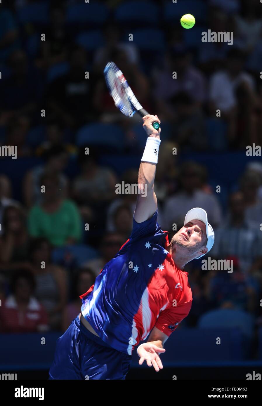 Perth, Australia. 7th Jan, 2016. Leyton Hewitt of team Australia serves ...