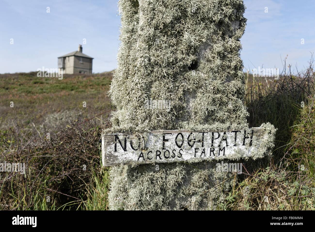 Weathered sign " no footpath across farm " in Cornwall, UK Stock Photo ...