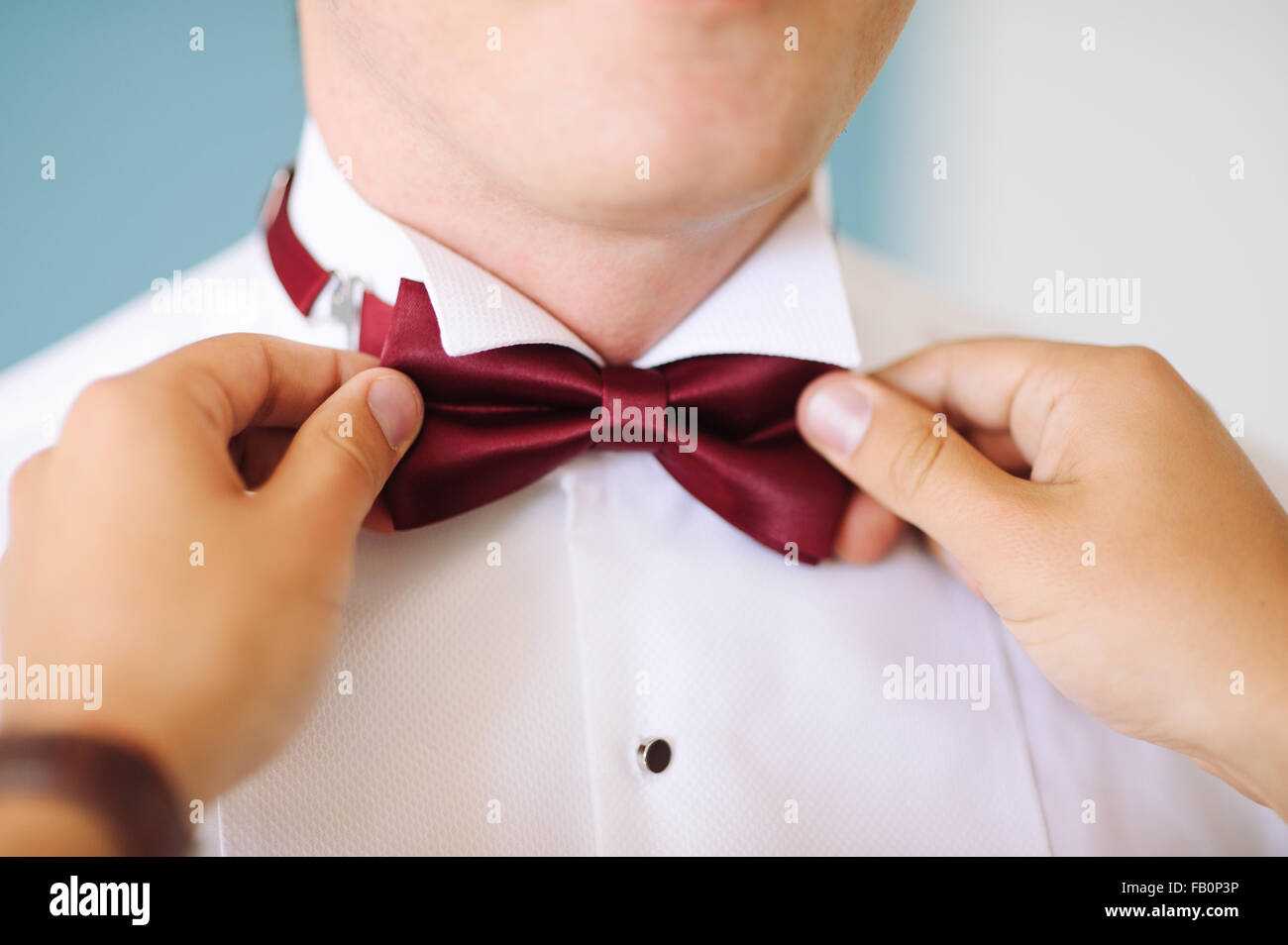 Clothing adjustment hi-res stock photography and images - Alamy