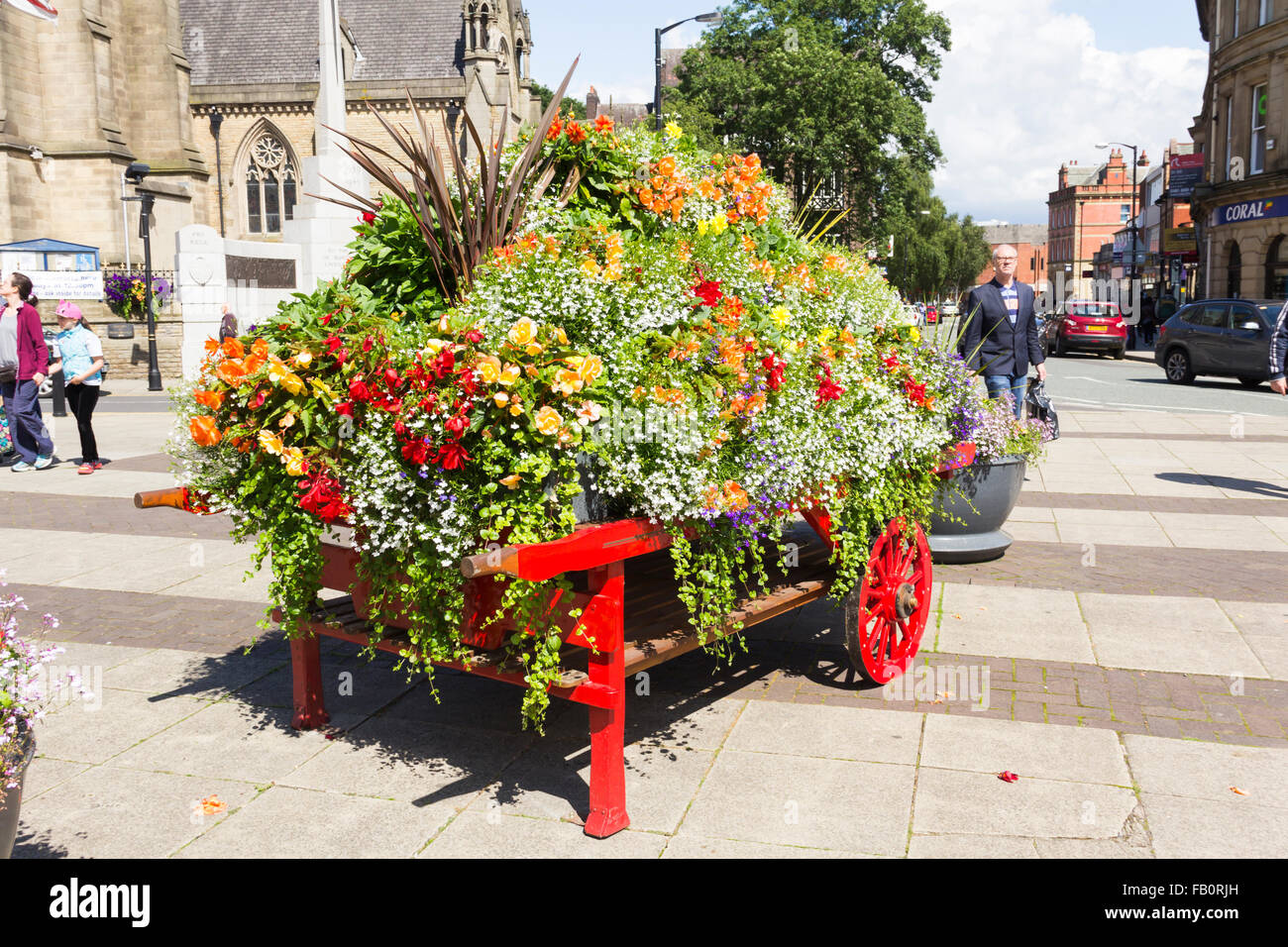 Flower display built round a hand cart type market barrow in Market ...