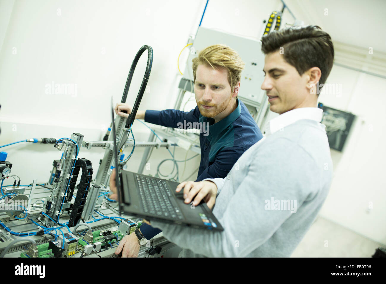 Engineers in the factory Stock Photo - Alamy