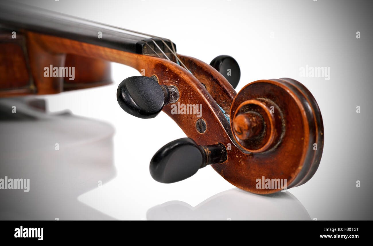 Close up shot of a violin head isolated on white Stock Photo - Alamy